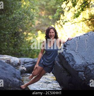 A person cools off in front of a Chicago Fire Department during a hot ...