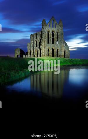 Whitby Abbey at night, illuminated by torch light Stock Photo - Alamy