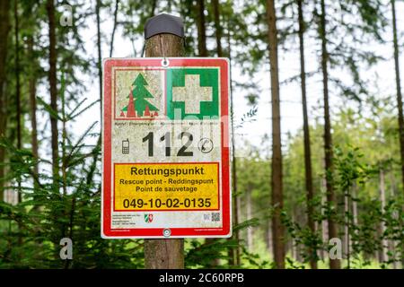 Rescue point system in German forests, on boards are indicated ...