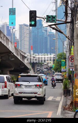 MANILA, PHILIPPINES - DECEMBER 7, 2017: Street view of Makati Avenue in ...