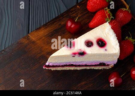 Soft berry souffle cake decorated with berries Stock Photo - Alamy