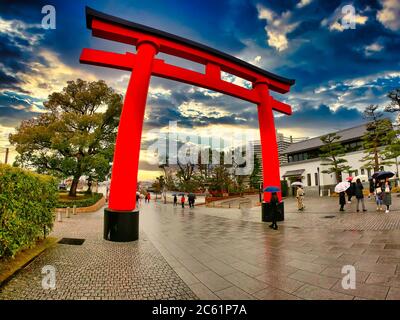Scenic view of a giant vermilion torii gate at the Shinto Shrine ...