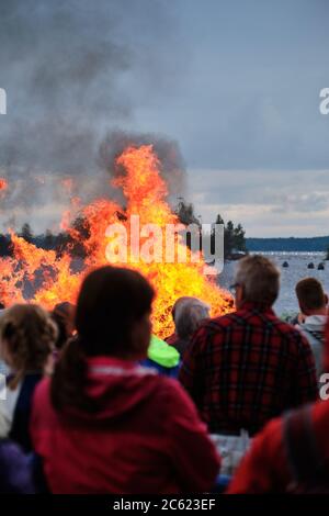 Midsummer bonfire. Traditional Finnish celebration Juhannus Stock Photo ...