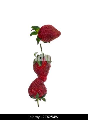 Top-down close-up of a ripe red tomato cut in half, one half showing ...