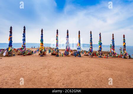 Shaman rock and ritual pillars on lake Baikal Stock Photo - Alamy