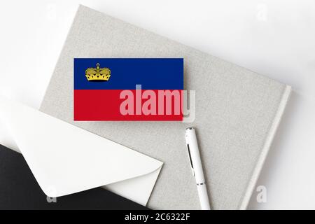 Liechtenstein flag on minimalist paper background. National invitation ...