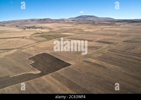 Aerial view of farmland on the Turkish steppes near the city of Kars ...