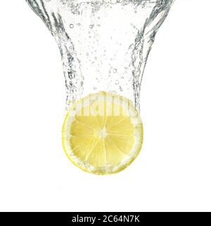 wave of lemon juice with lemon slice, isolated on white Stock Photo - Alamy