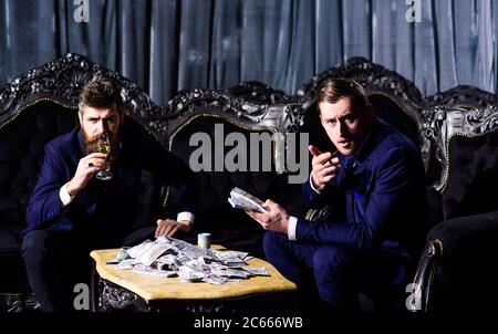 Gangsters with money, alcohol and cigarette. Success and confidence ...