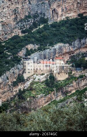 Our Lady of Hamatoura located in village of Kousba, in the rocky hollow ...