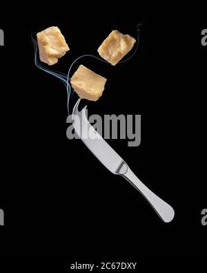 cheese with a cheese knife Stock Photo - Alamy