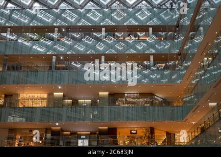 Tokyo, Marunouchi. KITTE building interior. The triangular atrium ...