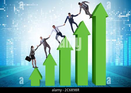 Colleagues helping each other to improve the results Stock Photo - Alamy