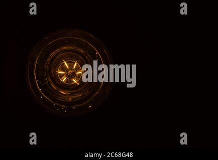 Vintage worm lamp lighting and black background photography Stock Photo ...