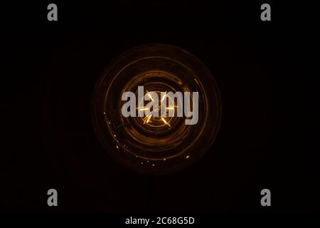 Vintage worm lamp lighting and black background photography Stock Photo ...