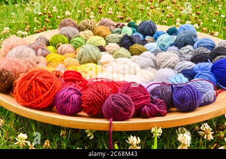 Yellow yarn twine on flat white cardboard spool Stock Photo - Alamy