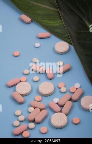 Colored tablets and capsules are removed from the package. Colored ...