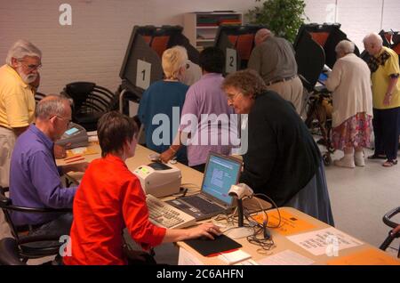 People cast their ballots at a polling station on municipal election ...