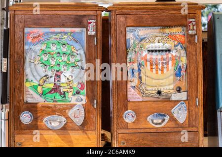 Vintage Penny Arcade machine in use at a village fete England UK Stock ...