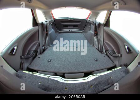 Car trunk from inside. Car trunk with rear seats folded Stock Photo - Alamy