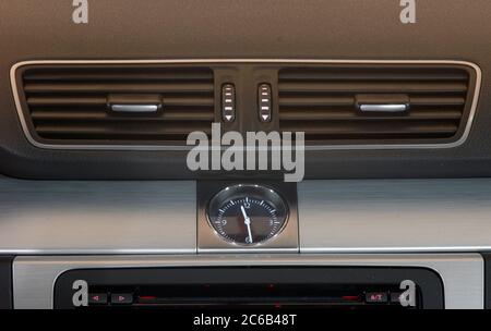 Automotive clock and ventilation holes Stock Photo - Alamy