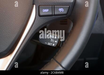 cruise control stick which is located behind the wheel Stock Photo - Alamy