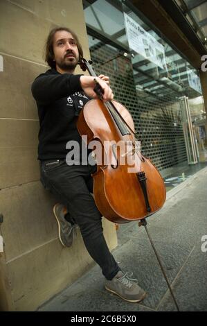 Street busker playing a cello in Rome, Italy Stock Photo - Alamy