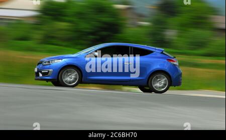 moving car, A panning shot of a speeding passenger car Stock Photo - Alamy