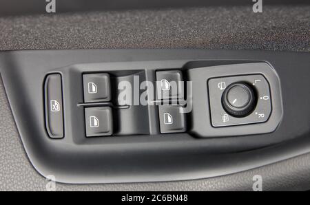 Side mirror switch control and window button Stock Photo - Alamy