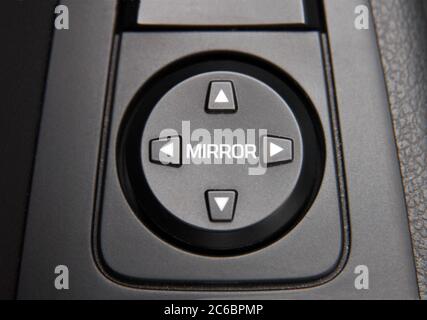 Side mirror switch control, car interior detail Stock Photo - Alamy
