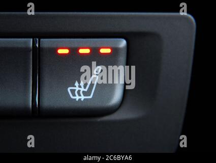 Switch to activate the heater in the car seats Stock Photo - Alamy
