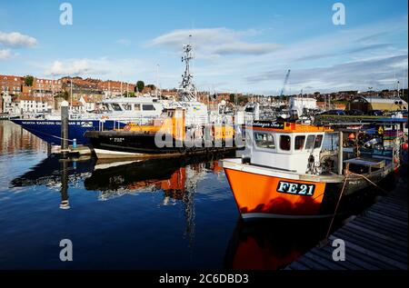 Whitby Trawlers in harbour 070720 Stock Photo - Alamy