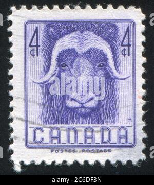 CANADA - CIRCA 1955: a stamp printed in the Canada shows Torch, Dove ...