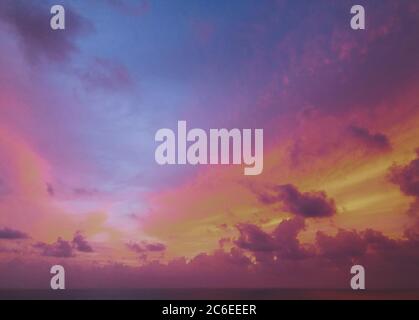 Beautiful bright sunset with multicolored evening glowing over skyline ...