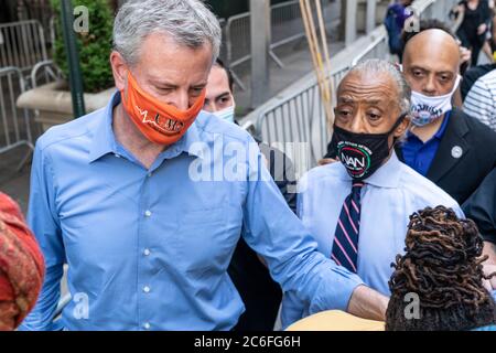 Volunteers paint Black Lives Matter on Fifth Avenue in front of Trump ...