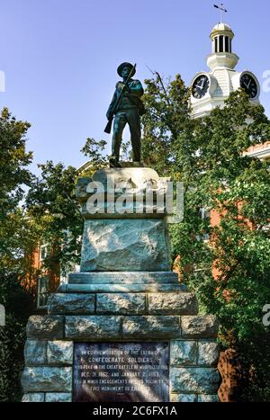 A commemorative Confederate Solider Statue on plinth base with plaque ...