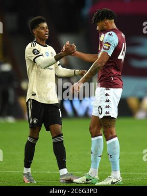 Aston Villa's Marcus Rashford (left) and Tottenham Hotspur's Archie ...