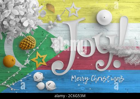 Comoros flag on wooden table with Joy text. Christmas and new year ...