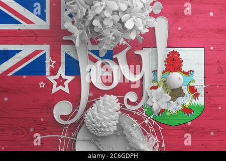 Bermuda flag on wooden table with snow objects. Christmas and new year ...