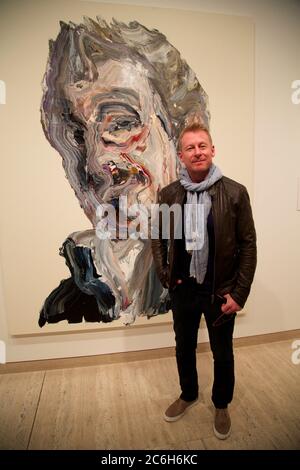 Actor Richard Roxburgh standing in front of the painting of him by ...