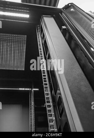 Computer servers in cabinets Stock Photo - Alamy
