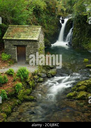 The Grot summer house and Rydal Falls in the gardens of Rydal Hall in ...