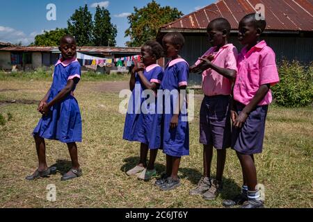 girls in school uniforms in Kenya Stock Photo - Alamy