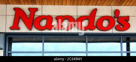 Nandos restaurant logo seen at one of their branches Stock Photo - Alamy