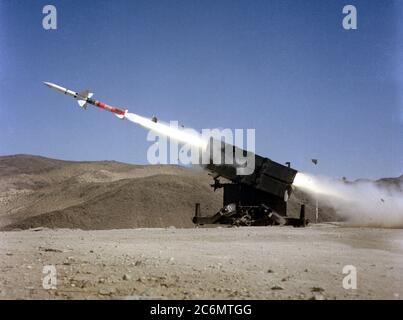 A left side view of an AIM-7F Sparrow III air-to-air missile being ...