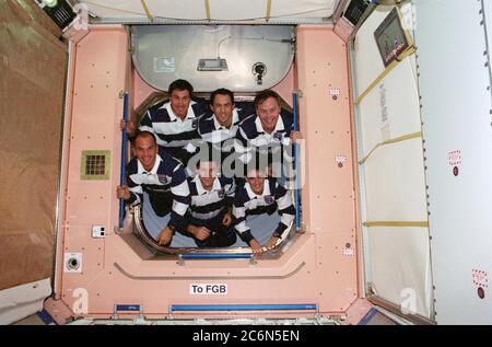 STS-88 Pilot Frederick W. "Rick" Sturckow arrives after dark at the ...