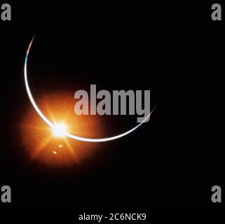 Earth from space during an eclipse. Artwork showing the shadow (lower ...