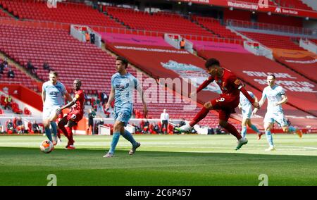 Liverpool's Roberto Firmino attempts a shot on goal during the Premier ...