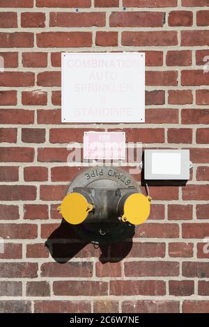 Old standpipe fire department connection Stock Photo - Alamy