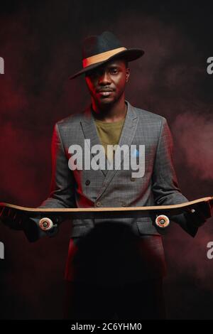 Young skateboarder with a longboard skateboard isolated on white ...
